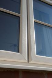Elegant Cream uPVC Casement Windows with a Woodgrain Finish